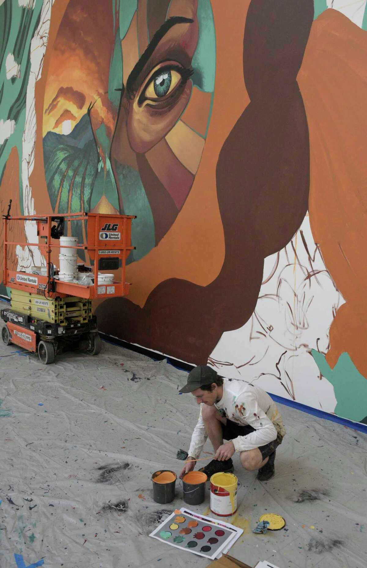 Kiptoe painting 1,800 square-foot mural at Danbury Fair Mall