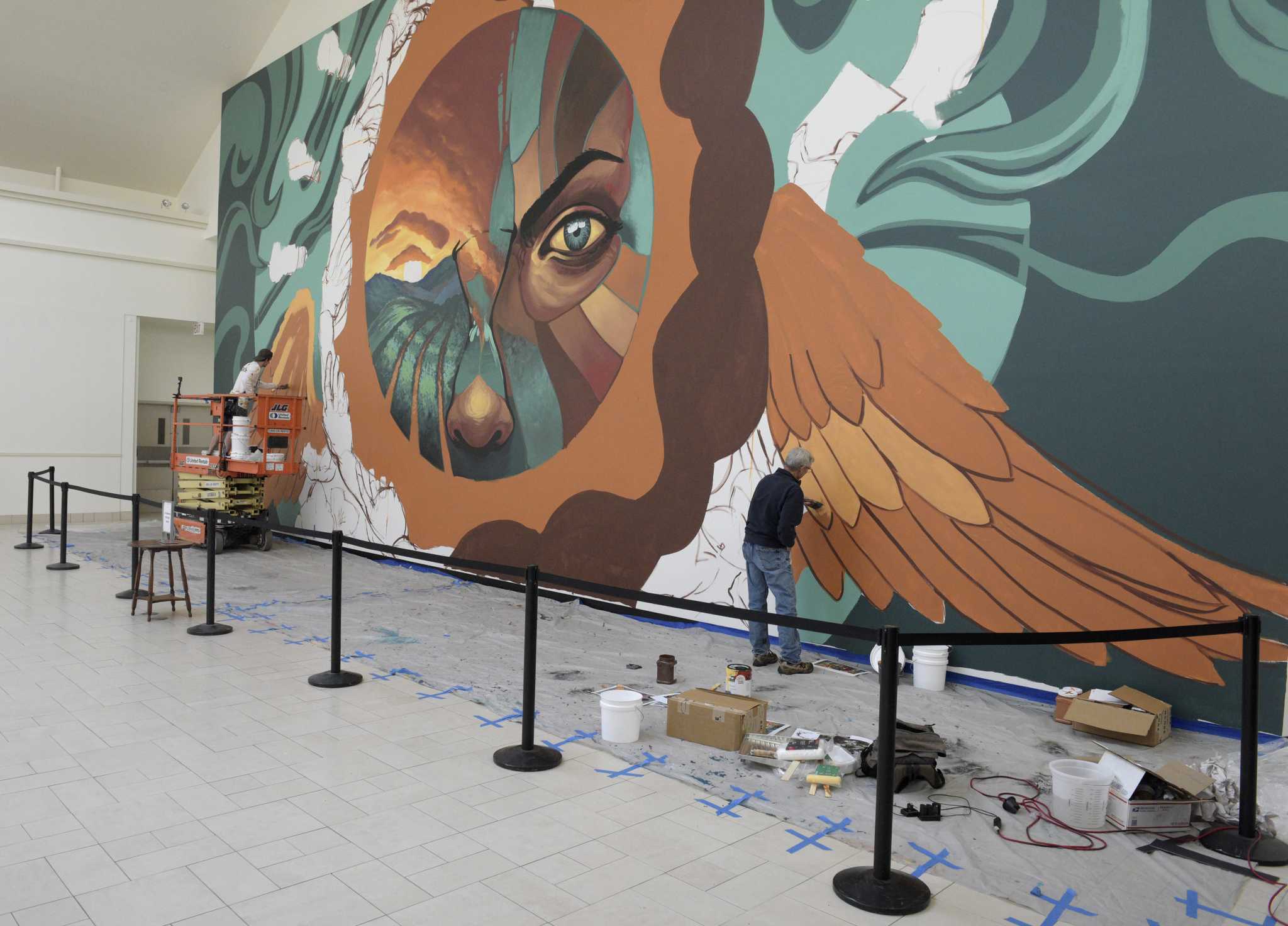 Kiptoe painting 1,800 square-foot mural at Danbury Fair Mall