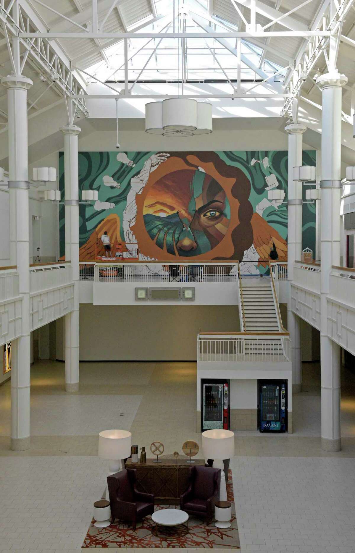 Kiptoe painting 1,800 square-foot mural at Danbury Fair Mall