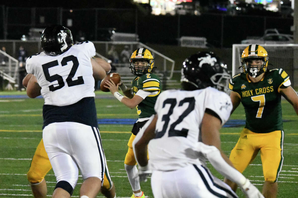 Holy Cross football success in the family for Drew, Jim Caouette