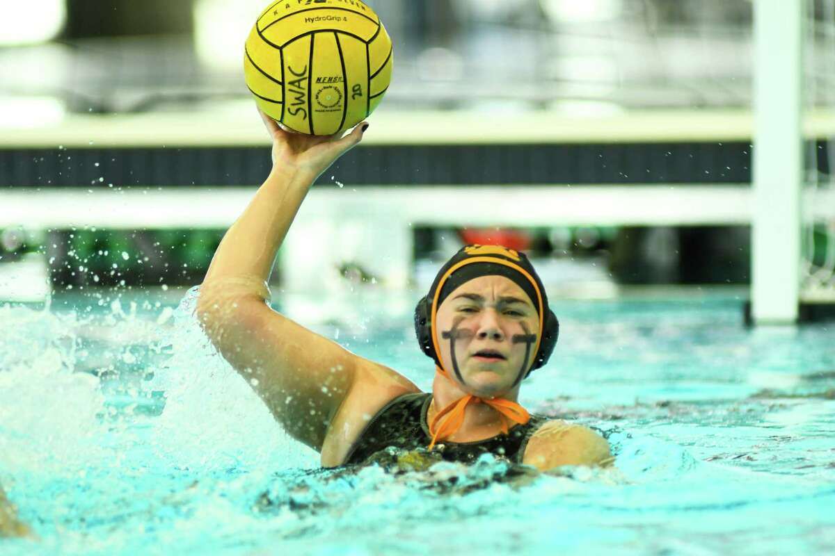 Scott Slay helps Champion’s water polo team find a direction