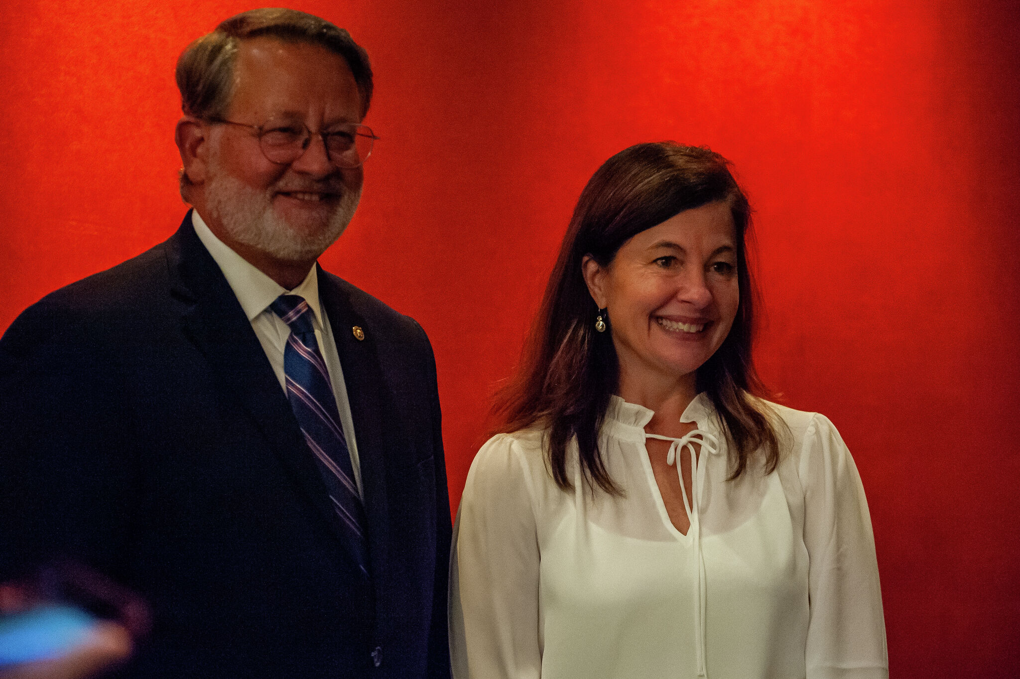 Sen. Gary Peters visits Midland, endorses Rivet