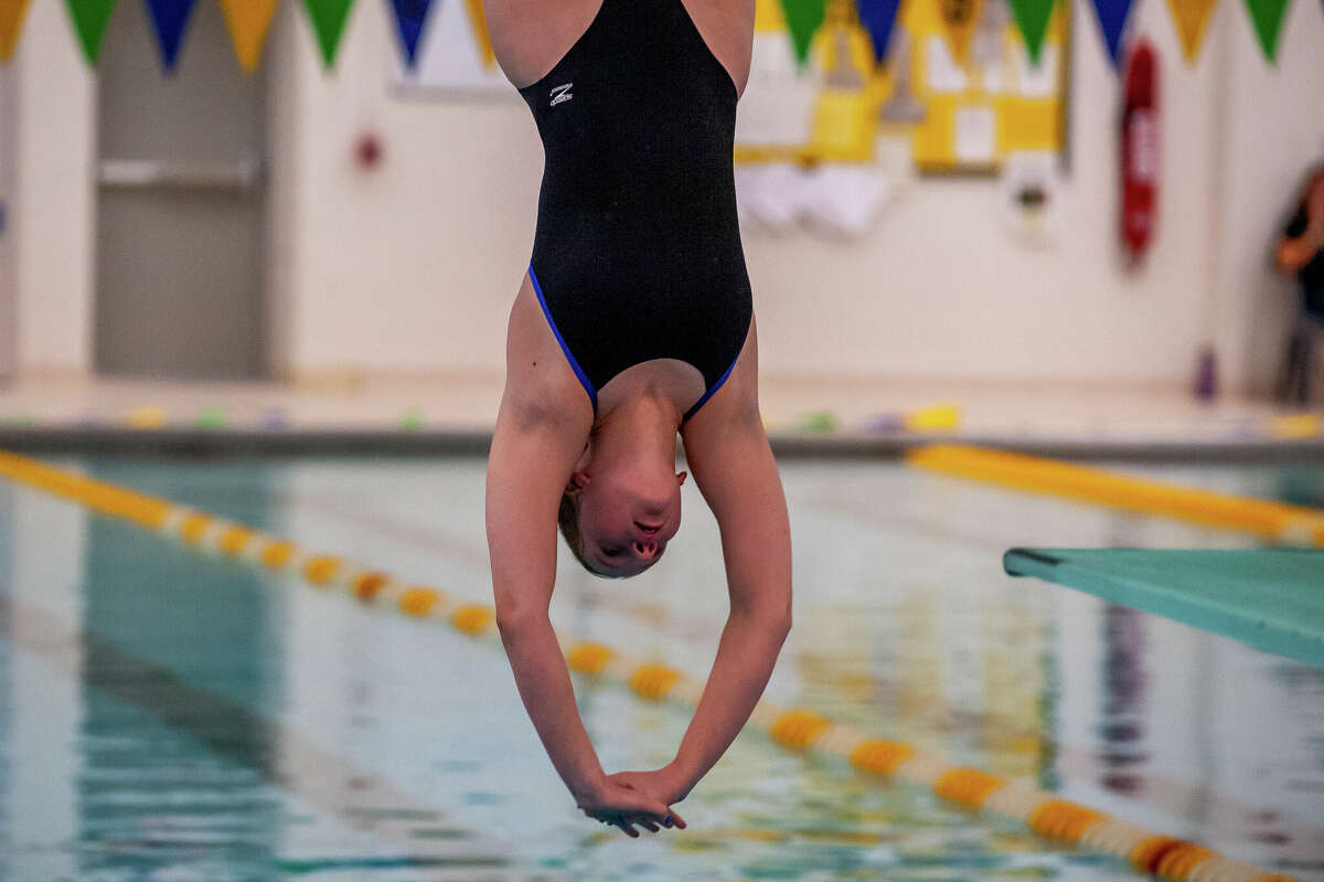 PHOTOS: Dow, Midland high schools meet for swimming and diving