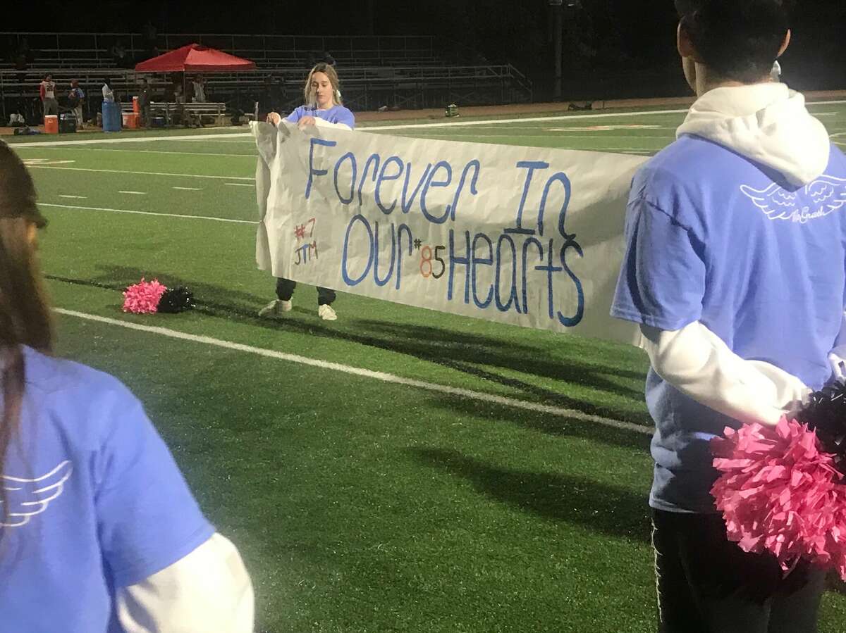 Jimmy McGrath honored at Shelton-Fairfield Prep football game.
