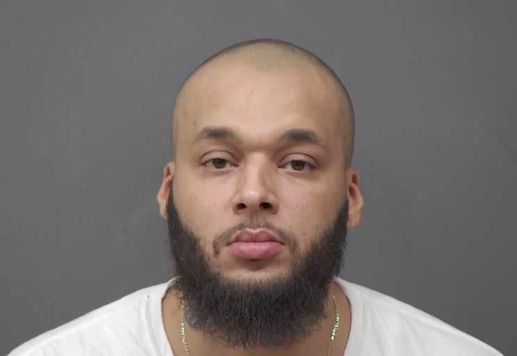 Norwich man wanted for shooting car arrested, police say