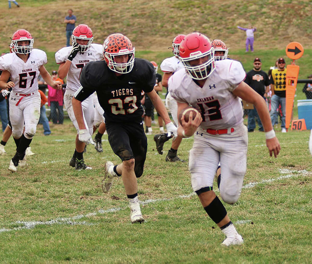 Greenfield gets physical, pounds Calhoun, 38-7