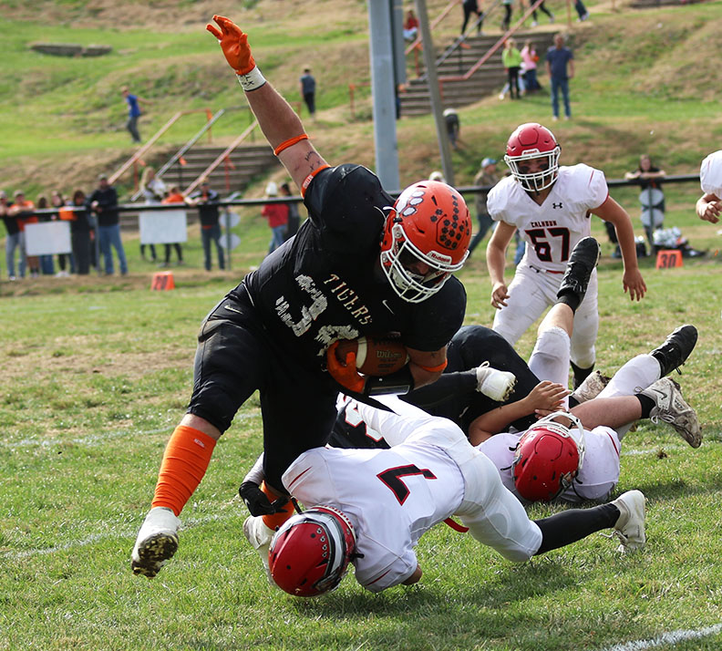 Greenfield gets physical, pounds Calhoun, 38-7