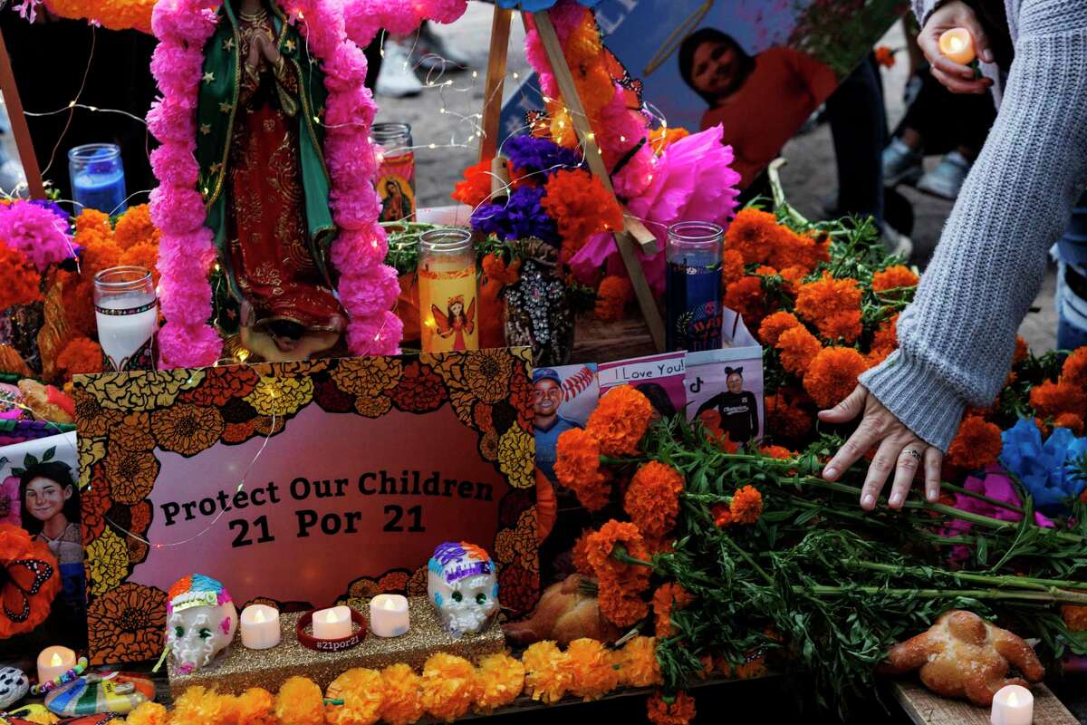 Uvalde families march in Austin for Dia de los Muertos