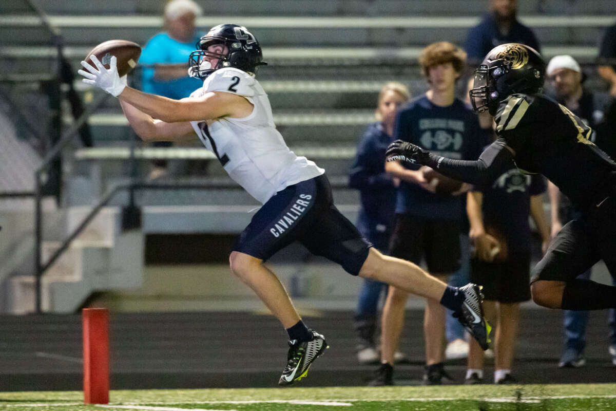 Conroe routs College Park to keep playoff hopes alive