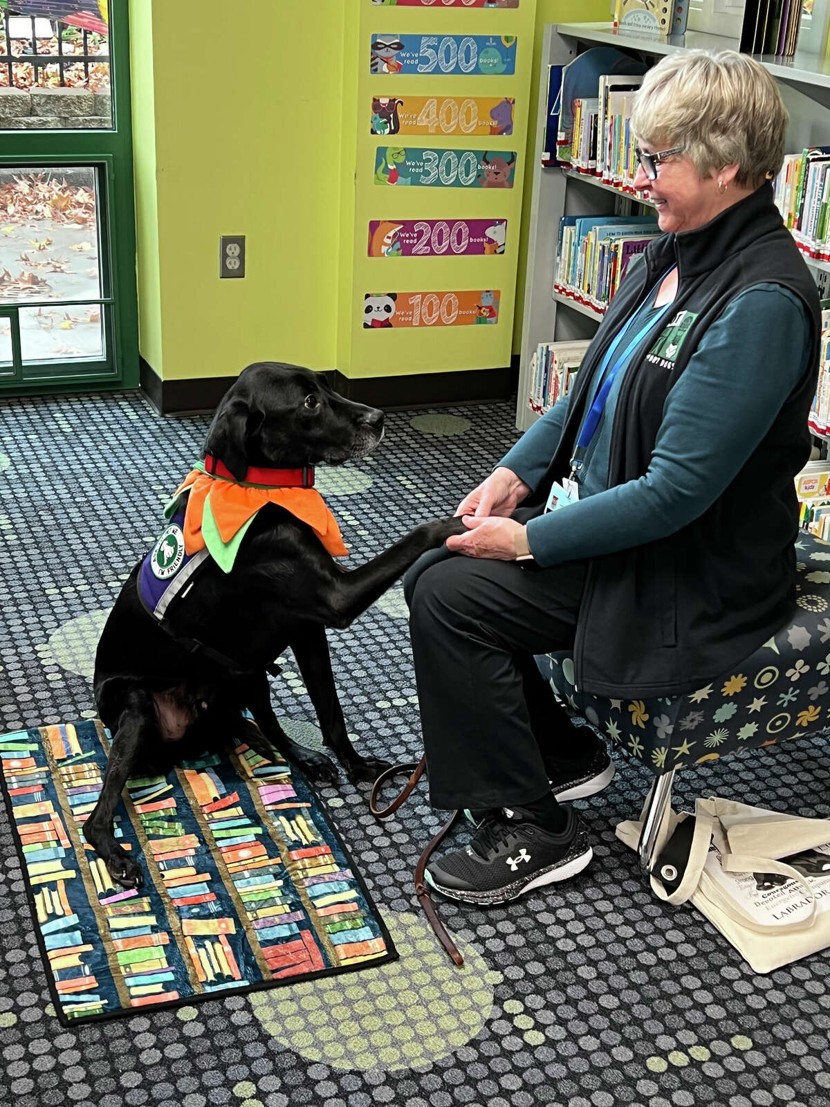 Youngsters enjoy 'Read to a Dog' days at library