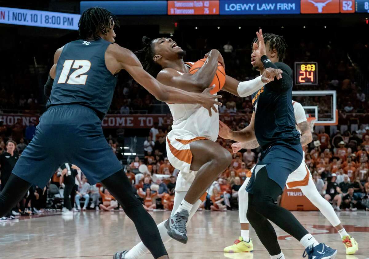 Transfers help No. 12 Texas open new Moody Center with a win