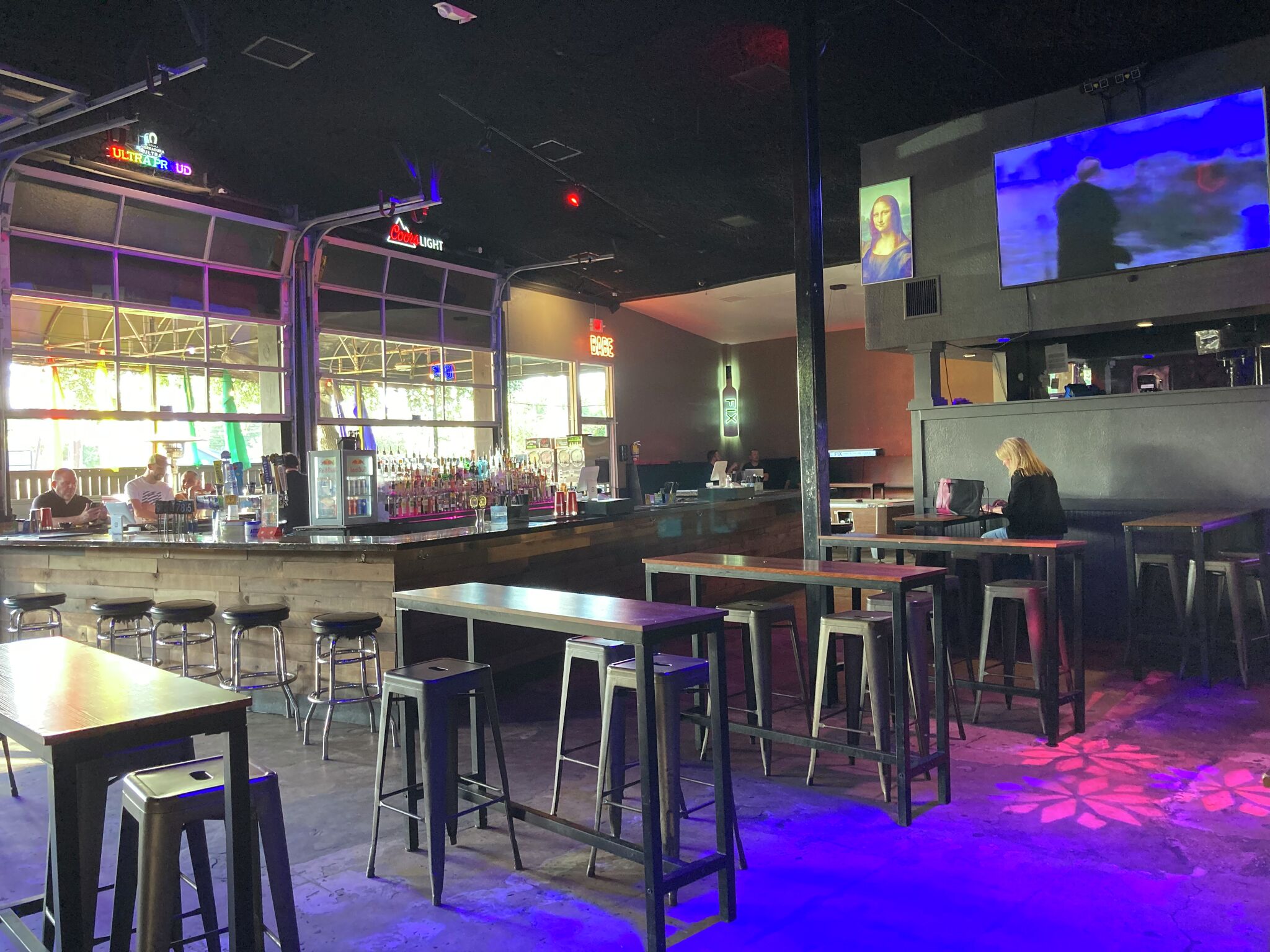 Houston voters cast a ballot at BUDDY's, a Montrose bar