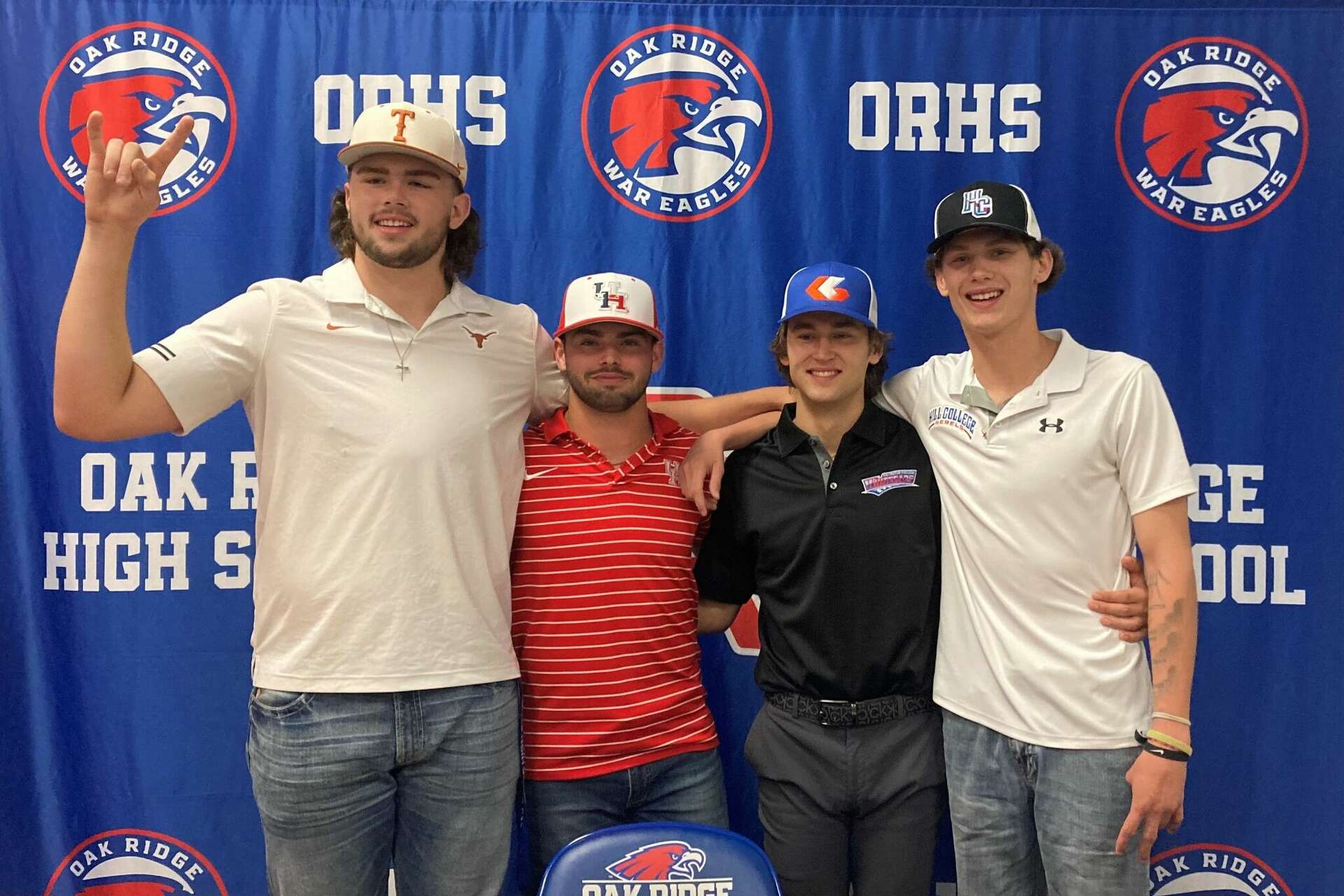 Four Oak Ridge baseball players sign during ceremony