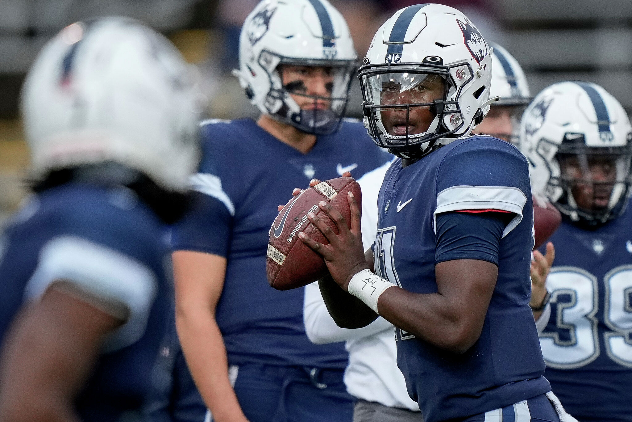 Turner, Fagnano, Roberson, and McDonald vie for UConn QB job.