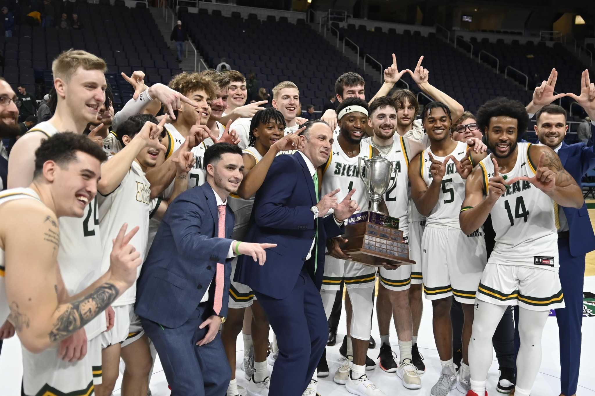 Michael Baer helps Siena basketball raise Albany Cup