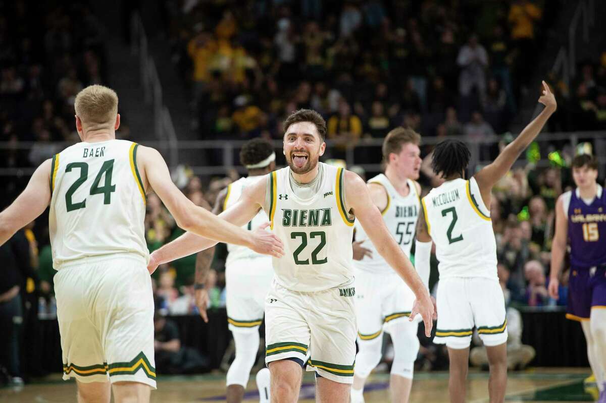Michael Baer helps Siena basketball raise Albany Cup