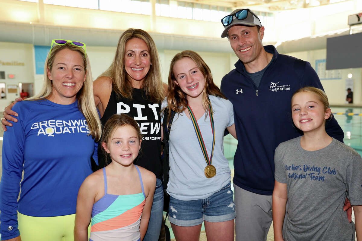YMCA of Greenwich lights up new scoreboard at pool