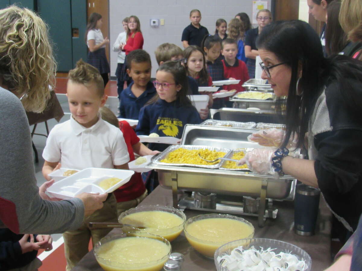 Evangelical School kids enjoy Thanksgiving Feast in Godfrey