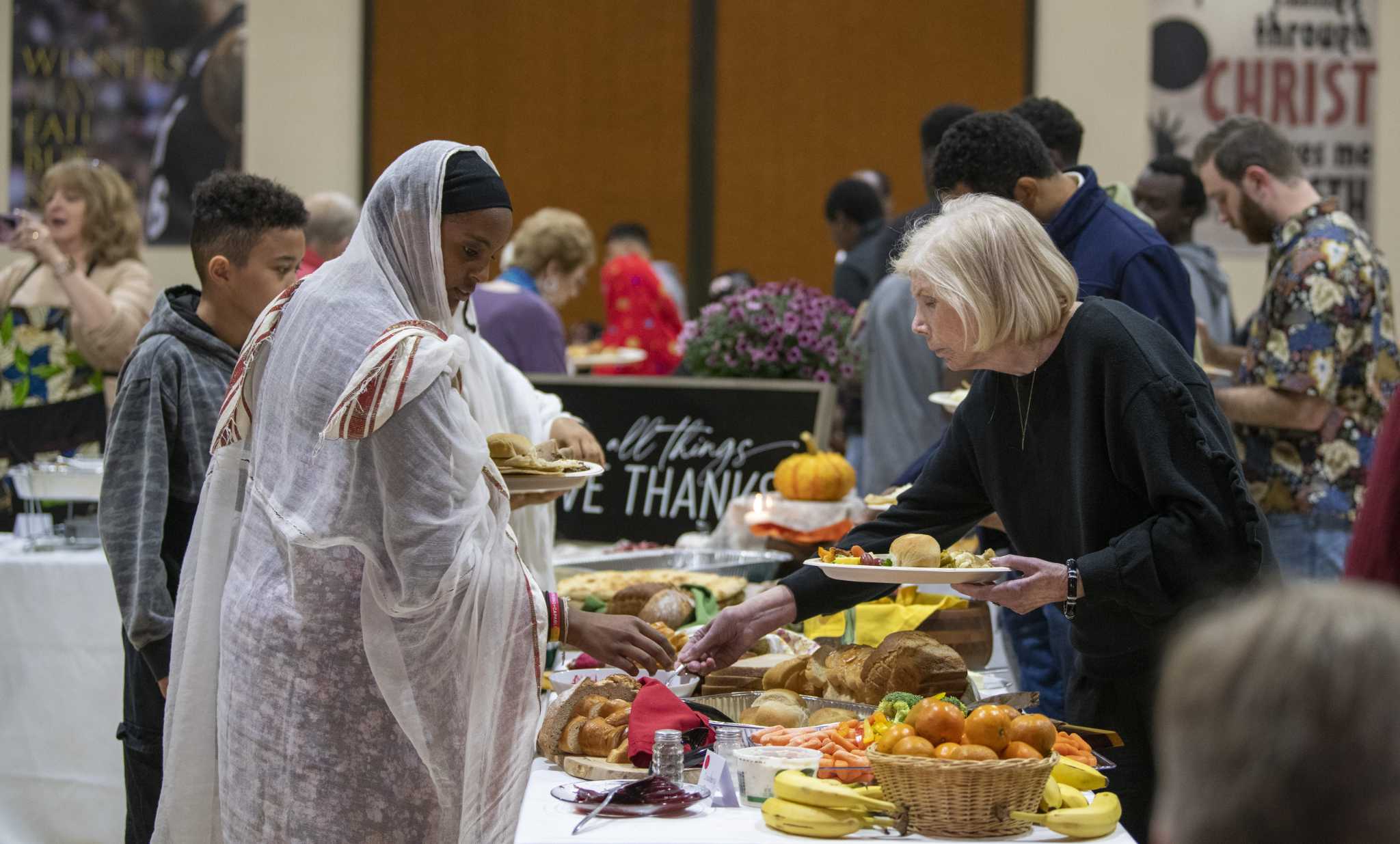 Church brings together Congolese, Ethiopian and Afghan families