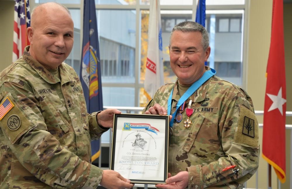 Colonel earns Legion of Merit; military budget director recognized