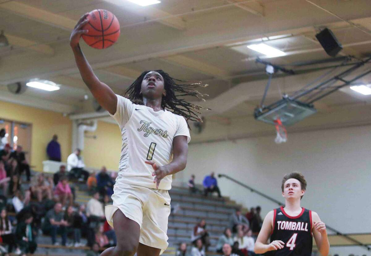 Boys basketball: Conroe shows grit in close win over Tomball