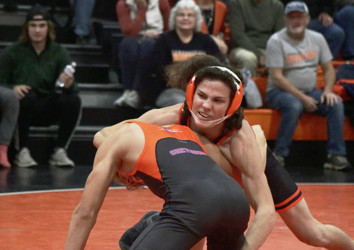 Tigers start the season hot on the mats; Knights wrestling builds momentum