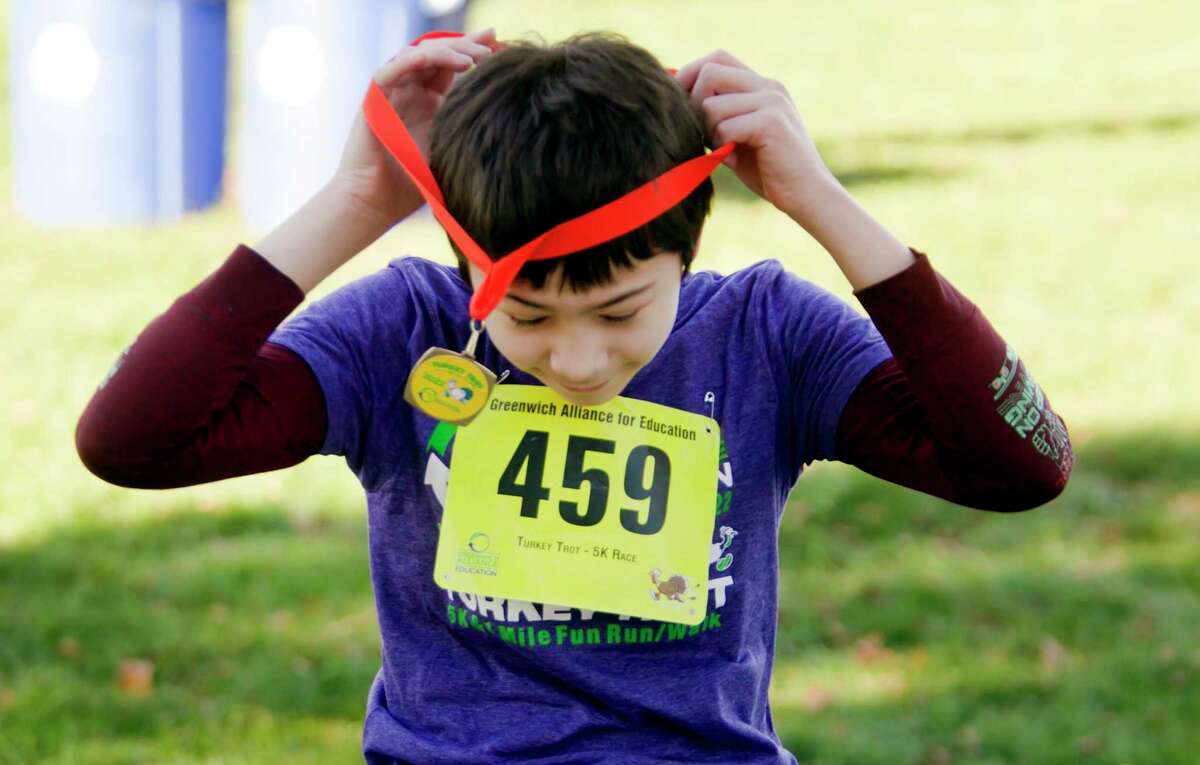 In photos: Turkey Trot hits the streets in town in support of the ...