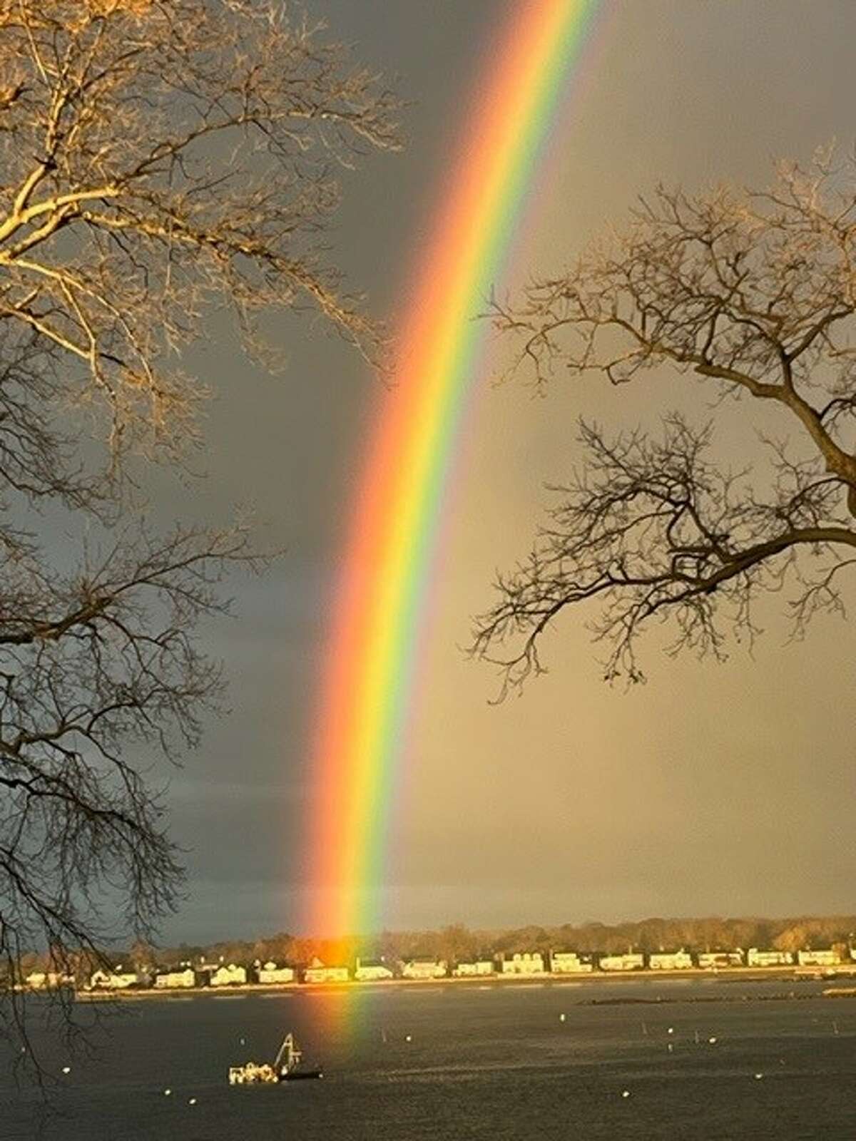 Double rainbow glimpsed over Stamford Harbor Monday morning