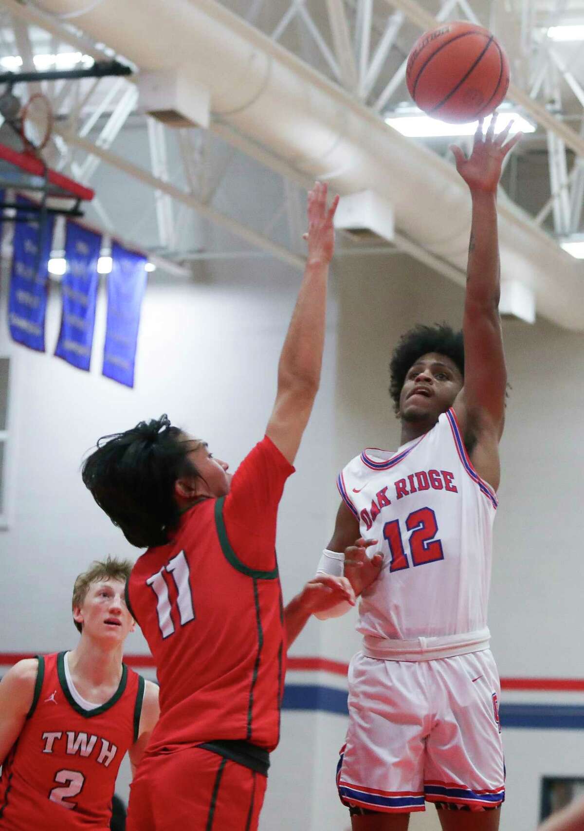 Eberwein's 30 points leads The Woodlands over Oak Ridge