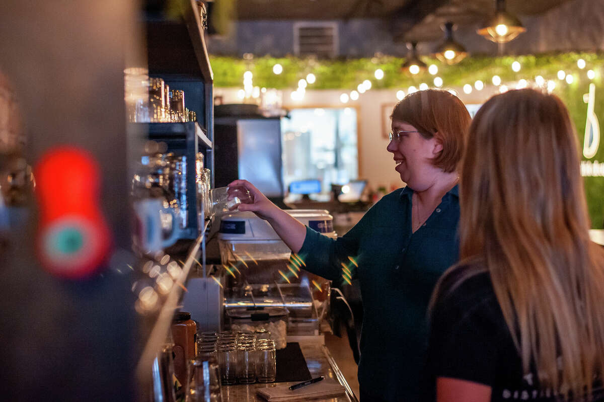 TORI TRIES...shaking things up as a bartender at Three Bridges Distillery