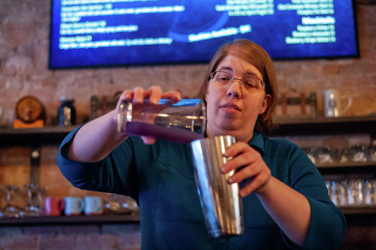 TORI TRIES...shaking things up as a bartender at Three Bridges Distillery