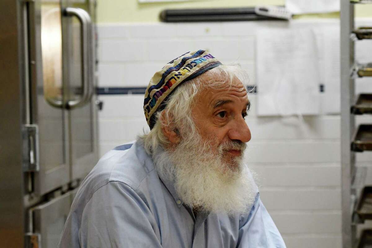 Couple will continue practice of baking for charity, scribing Torah