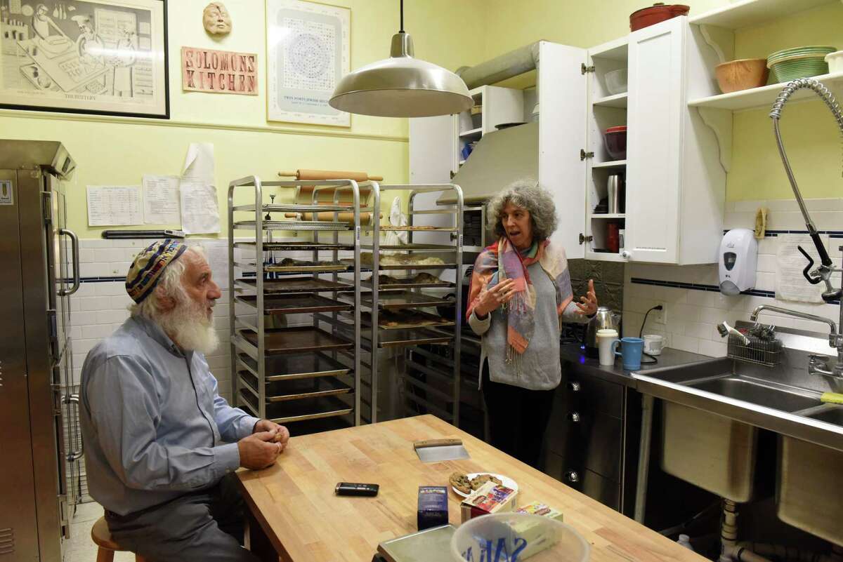 Couple will continue practice of baking for charity, scribing Torah