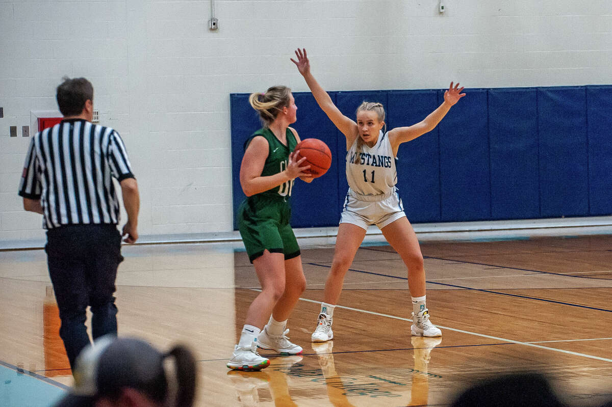 PHOTOS: Meridian clashes with Clare in girls basketball