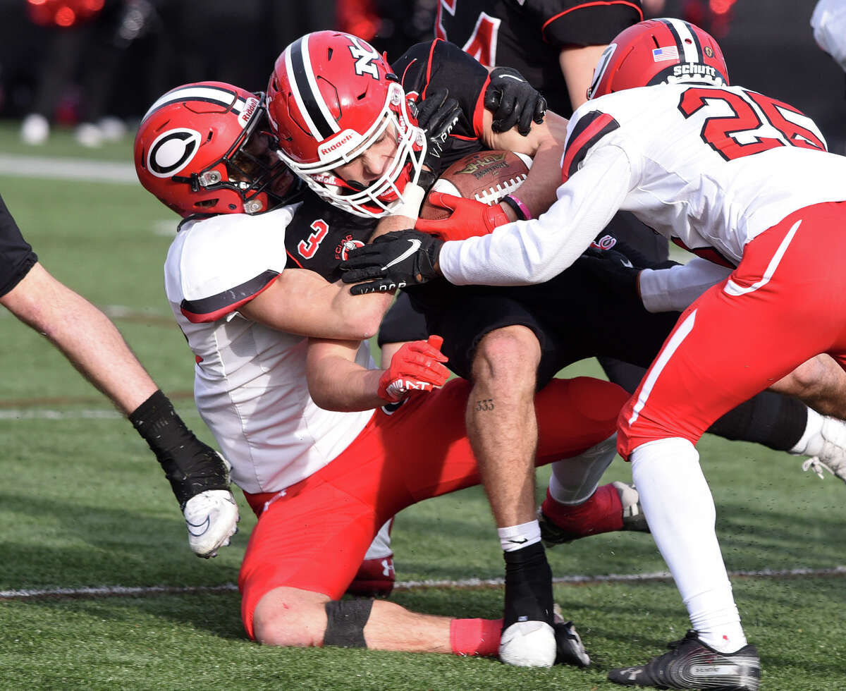 New Canaan football defeats Cheshire in CIAC Class L semifinals
