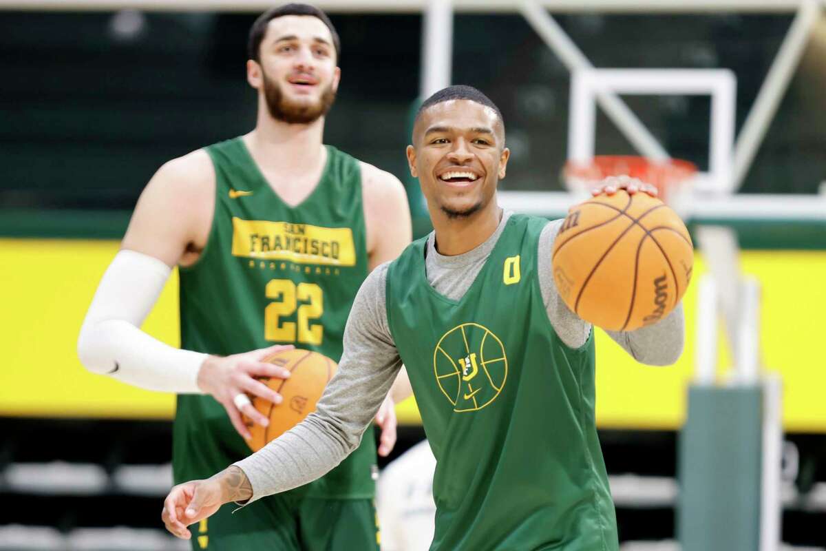 Away from USF hoops stardom, Khalil Shabazz raps as Lil Bazzy