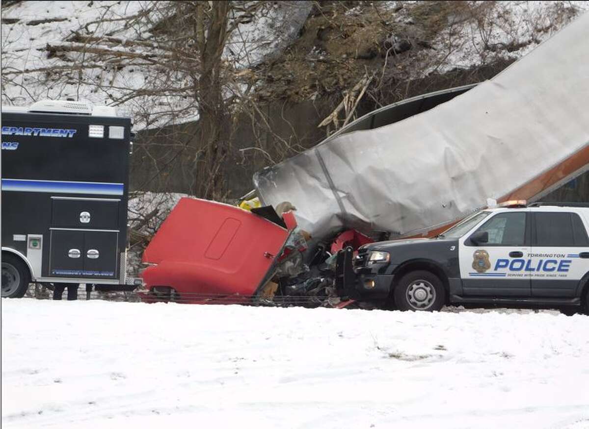 Police: Driver killed after truck plummets off Torrington bridge