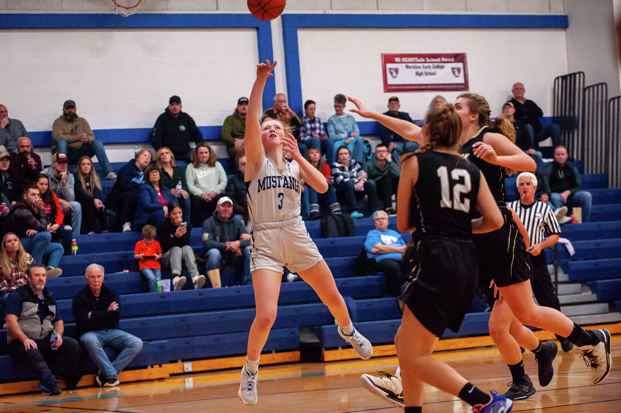 Meridian takes over 1st place; Midland girls win