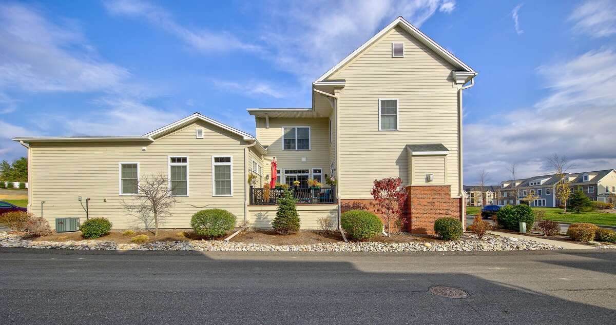 Latham town house with three bedrooms listed for less than $600,000
