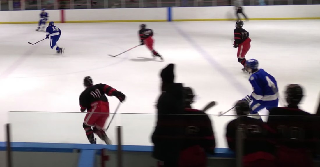 Fairfield hockey, back from tournament win, ties Darien.