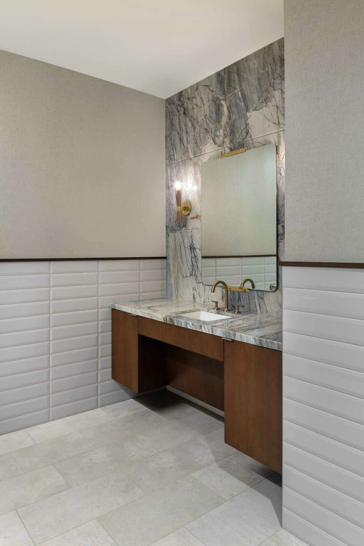 Fields Cos. enters new era in style with move to nearby Wortham Tower