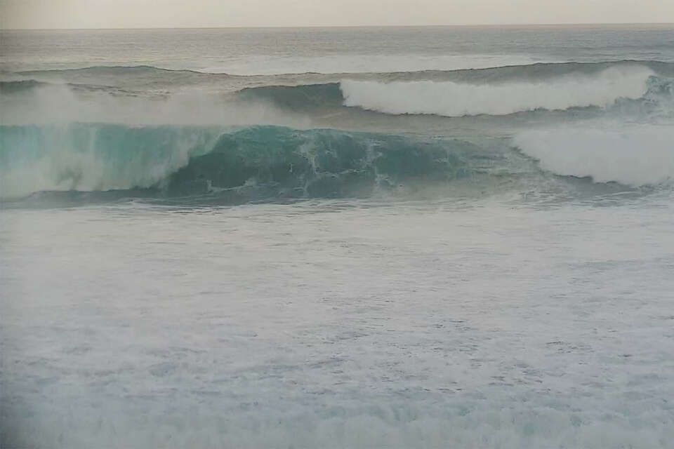 Massive waves up to 50 feet pound Hawaiian Islands