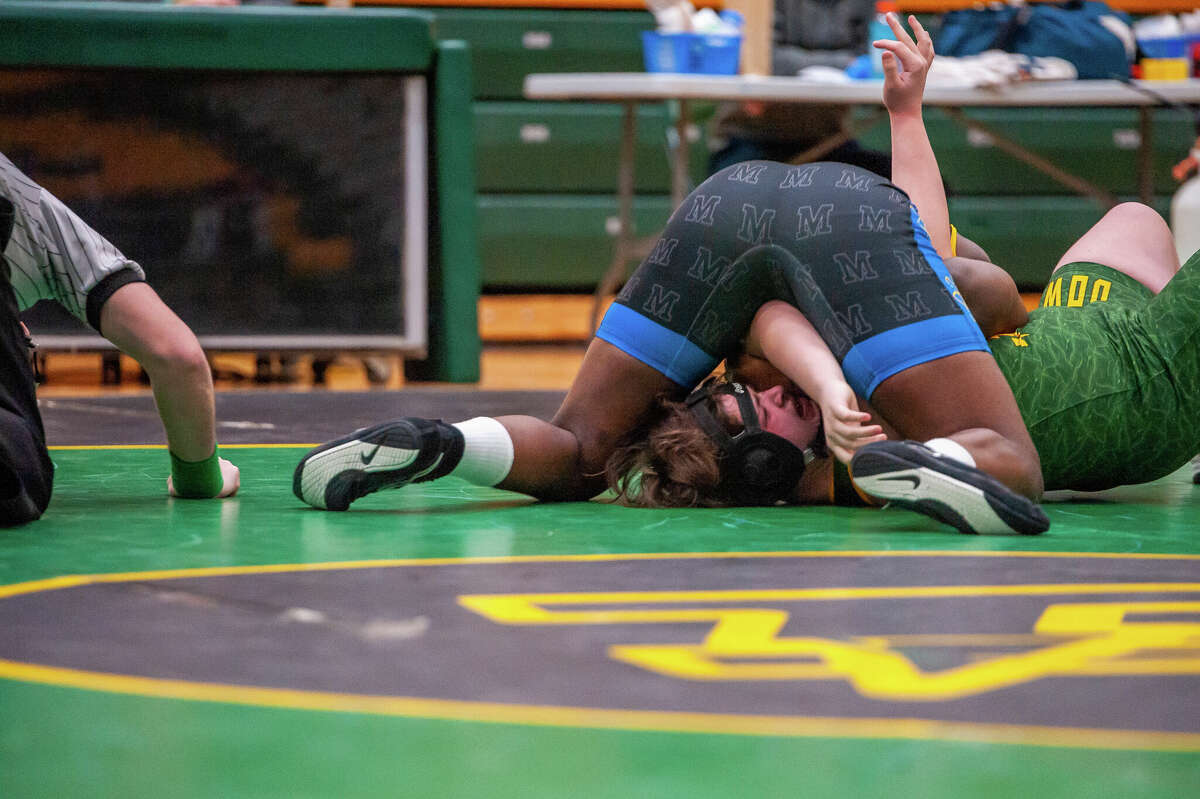 PHOTOS: Dow and Midland high grabble at wrestling meet