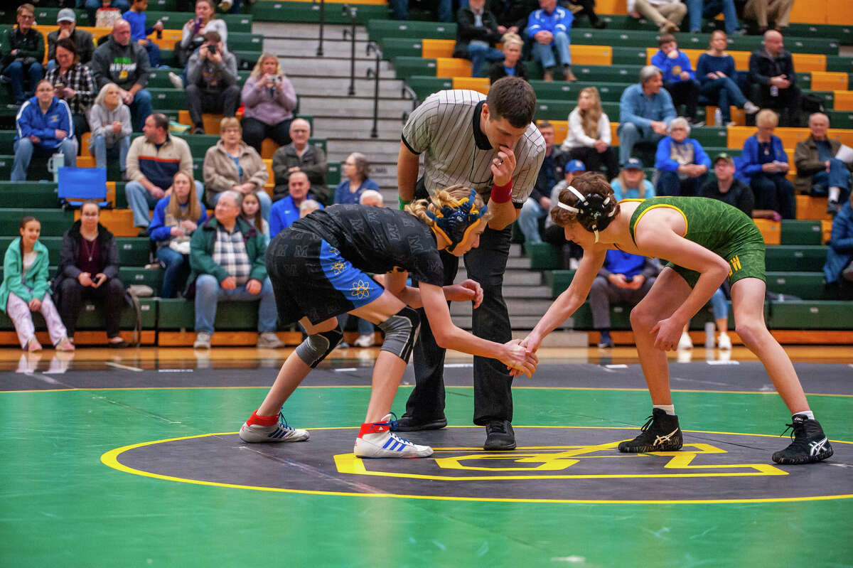 PHOTOS: Dow and Midland high grabble at wrestling meet