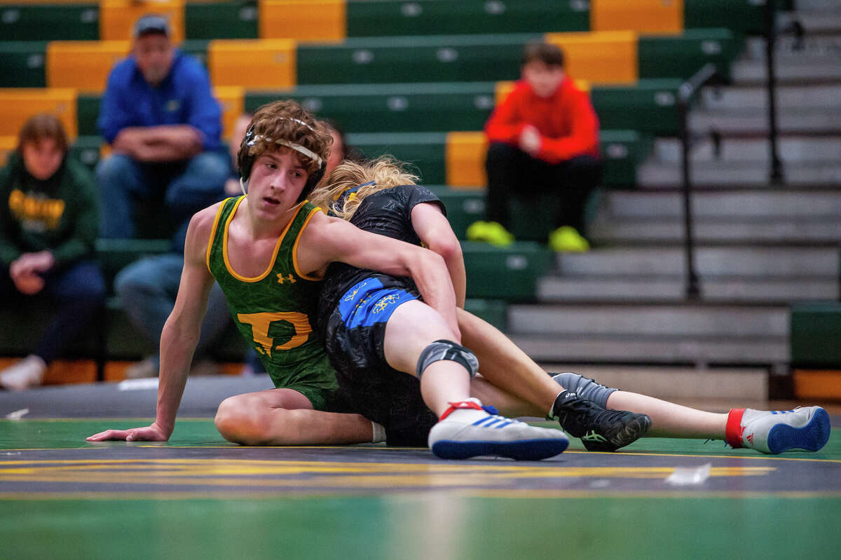 PHOTOS: Dow and Midland high grabble at wrestling meet