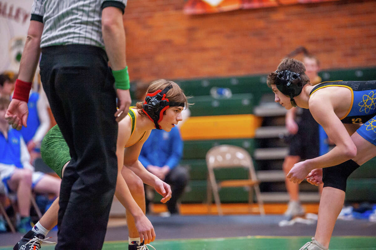 PHOTOS: Dow and Midland high grabble at wrestling meet