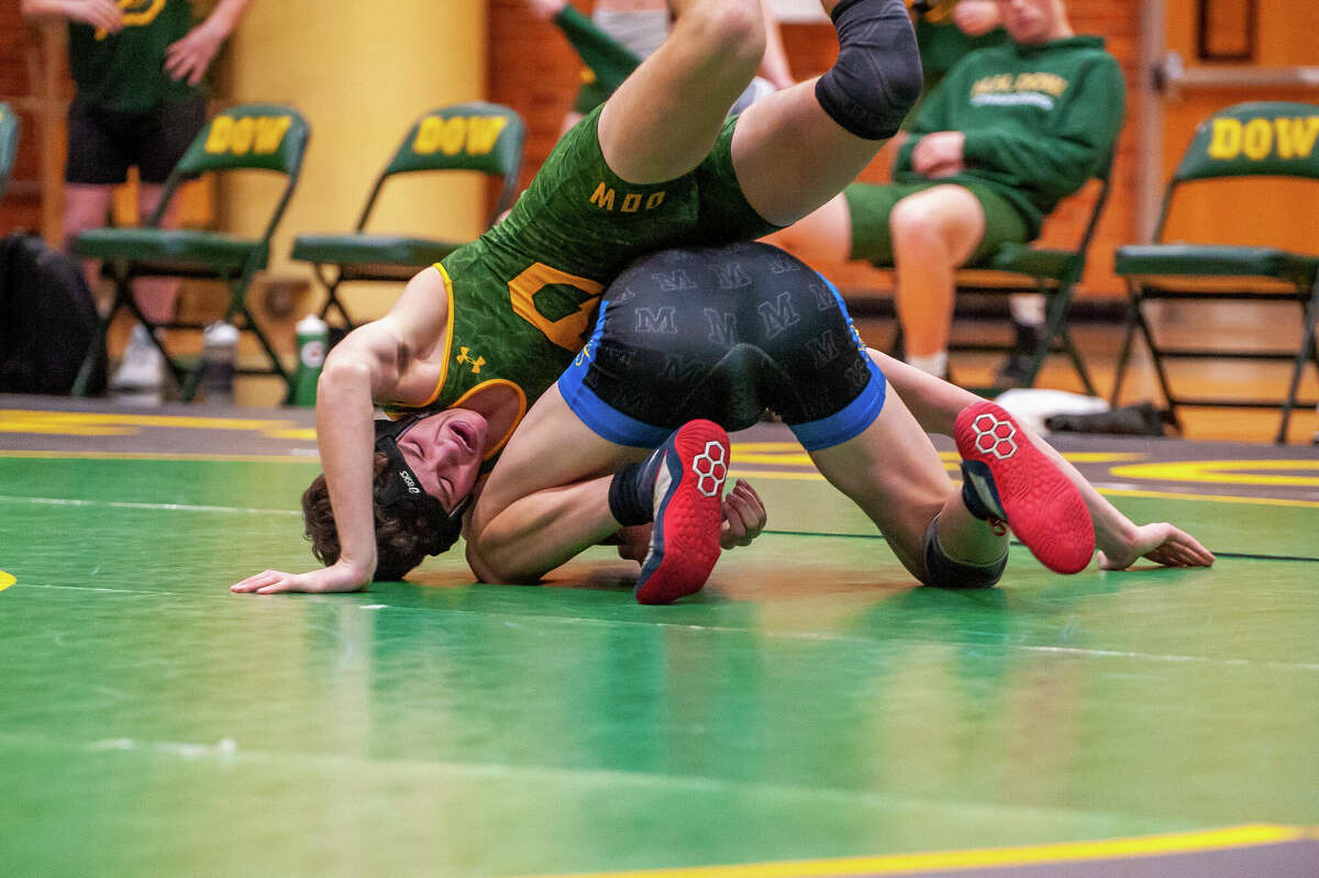 PHOTOS: Dow and Midland high grabble at wrestling meet