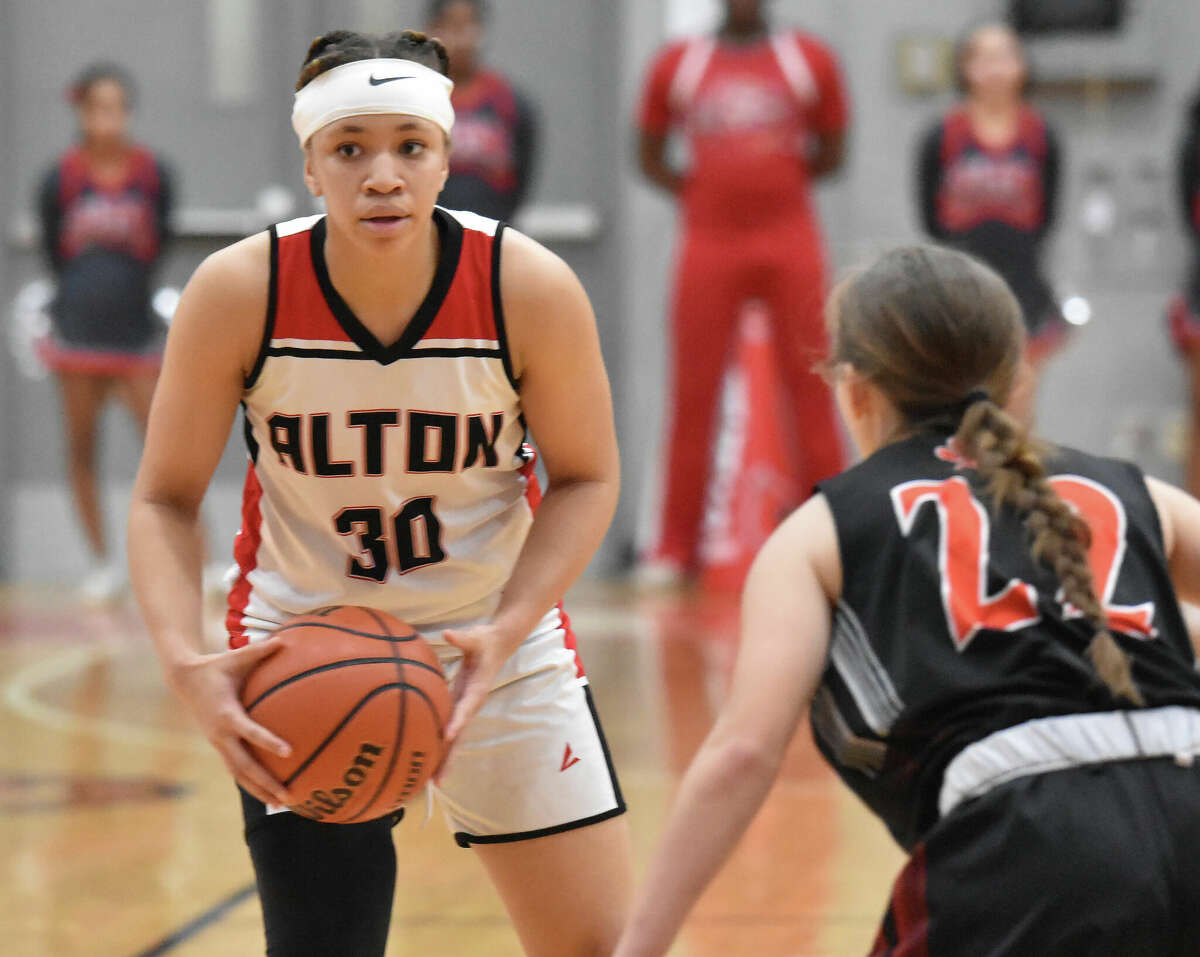 Record crowd shows up to see Redbirds fend off Tigers' upset bid