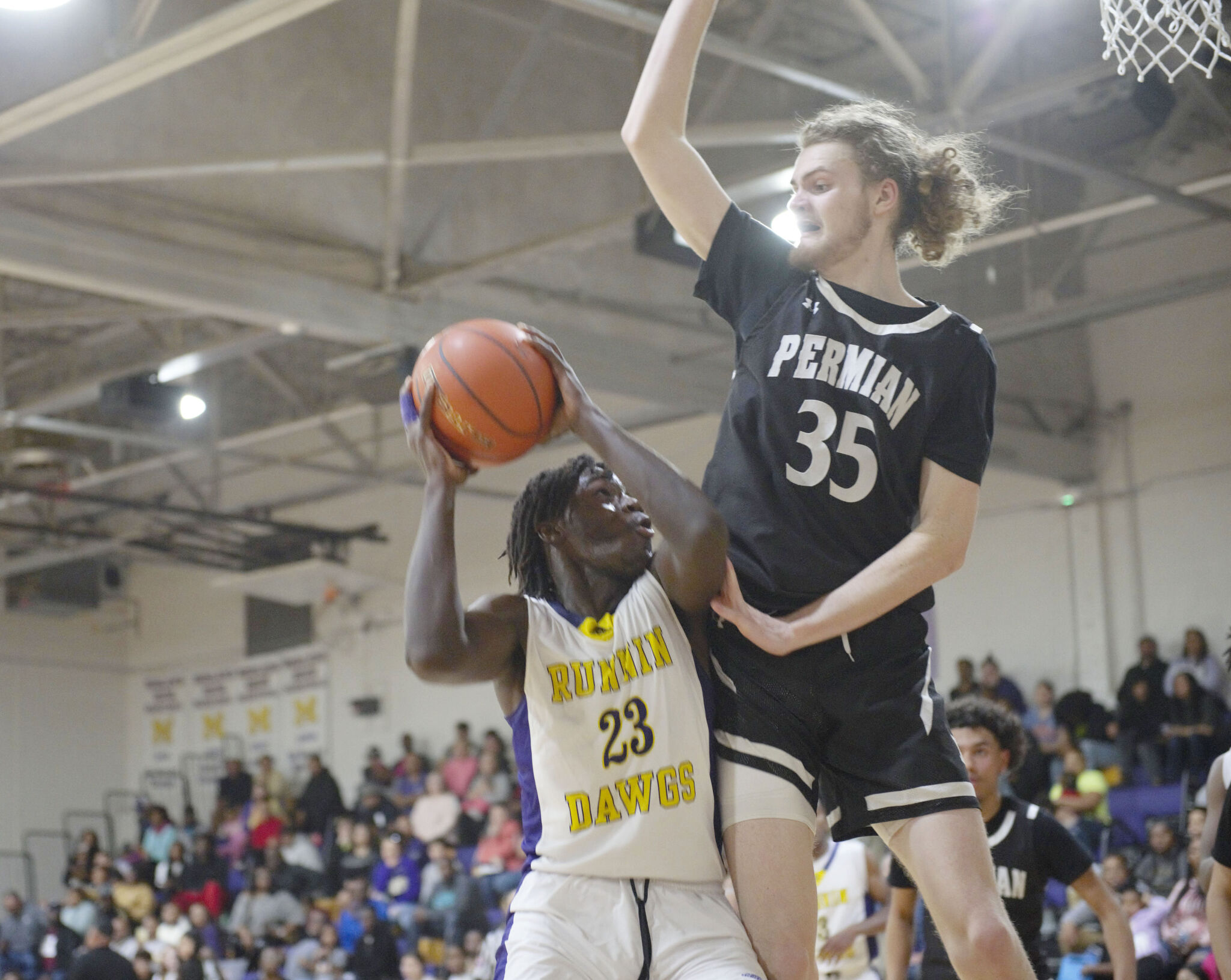 HS BOYS BASKETBALL: MHS beats Permian in District 2-6A opener
