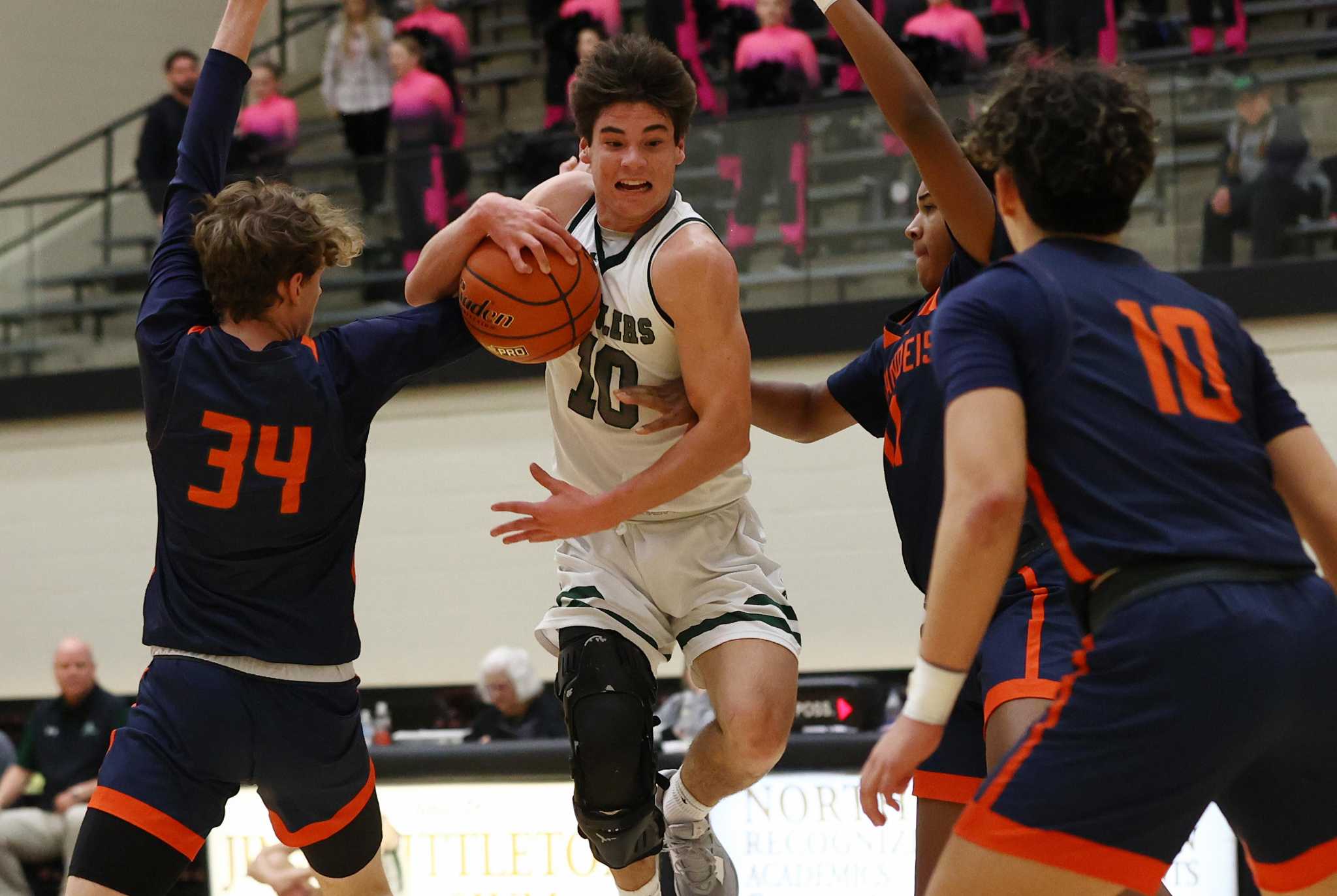 Boys basketball: Reagan stays in command in 28-6A